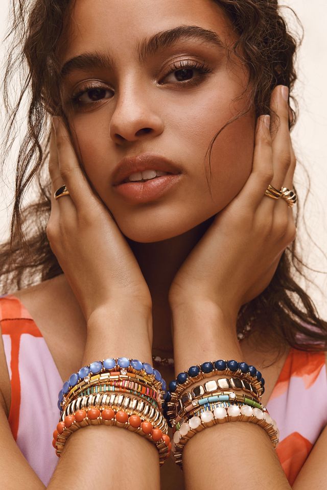 Pulsera en espiral con cuentas bañadas en oro | Anthropologie ES