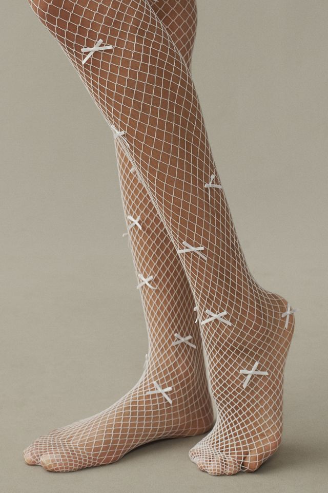 High Heel Jungle Fishnet Bow Velvet Flocking Premium Tights | Anthropologie