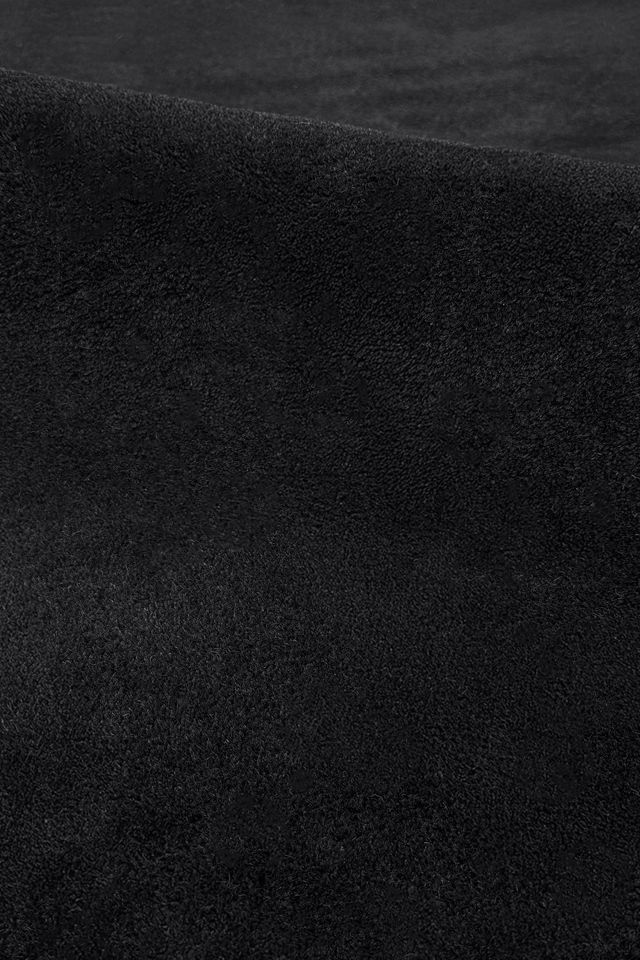 Jubi Solid Color Sculpted Edge Hand Tufted Wool Rug | Urban Outfitters