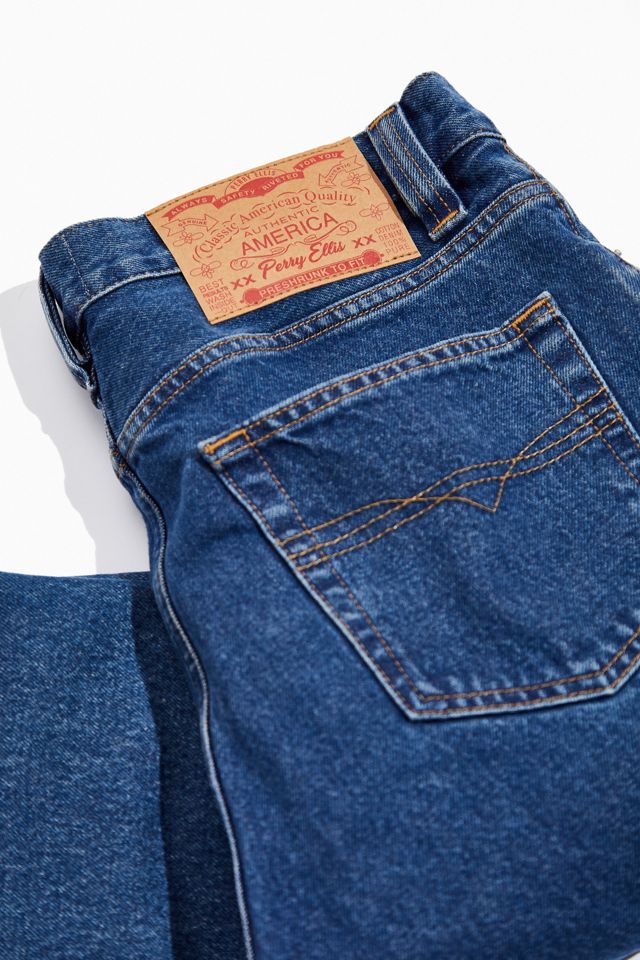Perry Ellis Medium Indigo Slim Jean | Urban Outfitters Canada