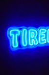 Tired Neon Sign | Urban Outfitters