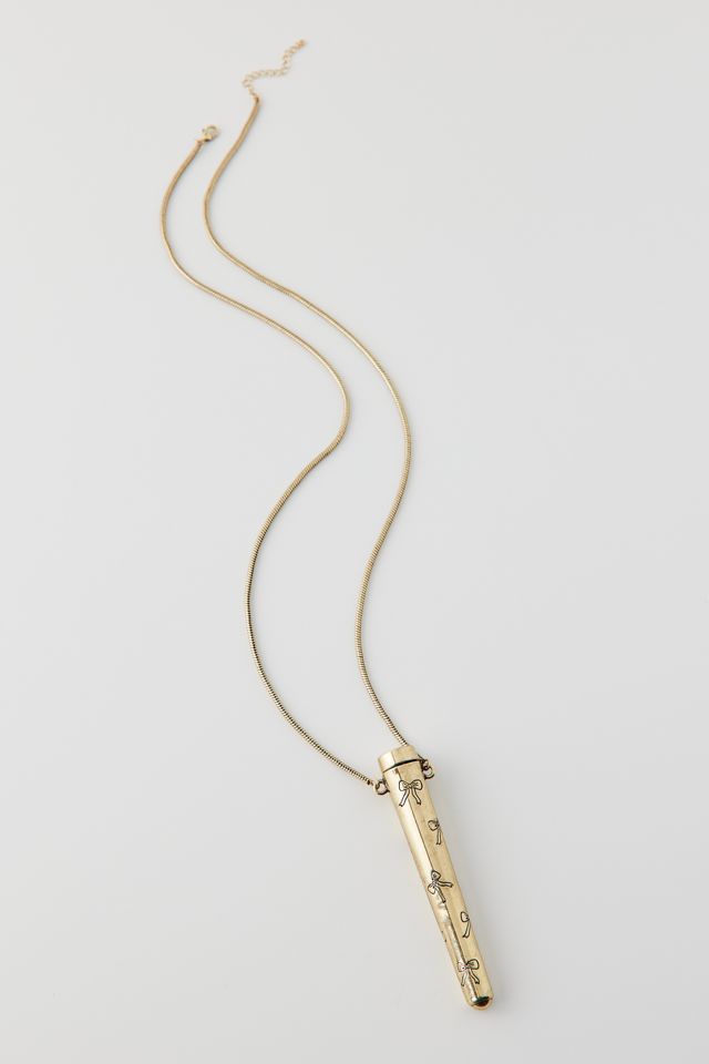 Etched Bow Stash Tube Necklace | Urban Outfitters