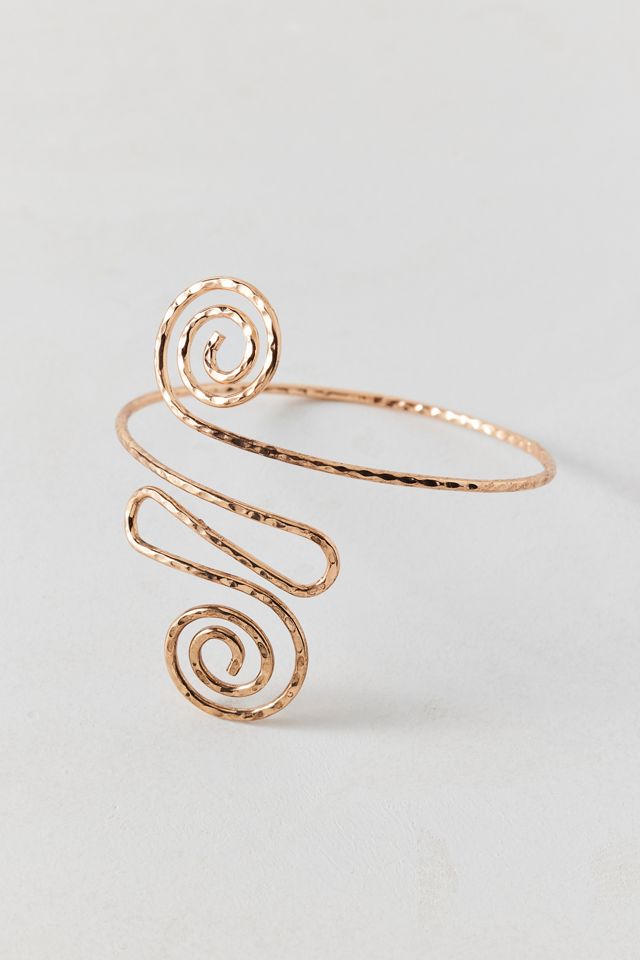 Hammered Metal Swirl Arm Cuff | Urban Outfitters